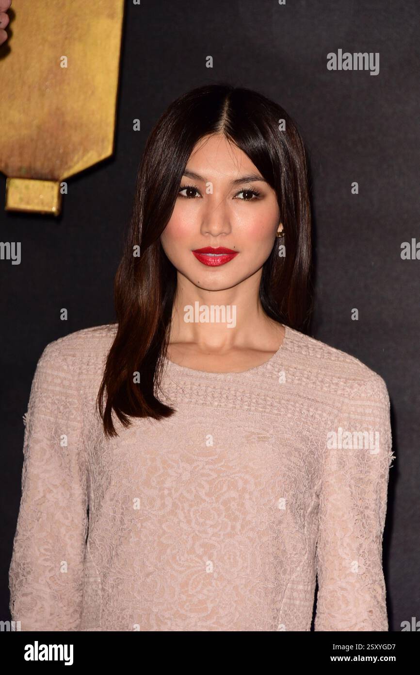 Gemma chan attending fantastic beasts hi-res stock photography and ...