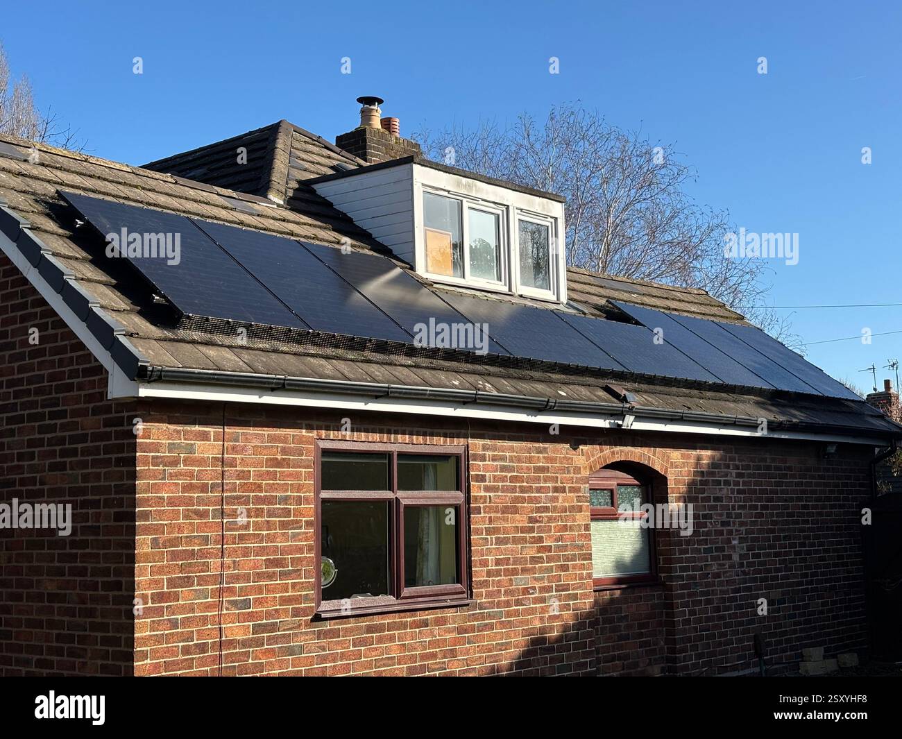 Rooftop solar panels in the sunshine Stock Photo - Alamy