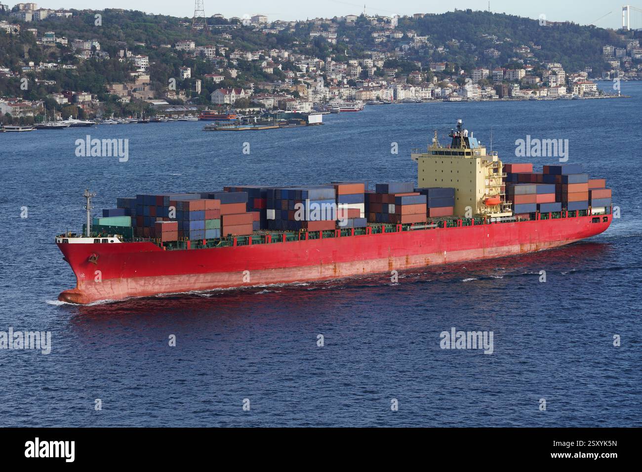 A container ship carrying goods between ports Stock Photo - Alamy