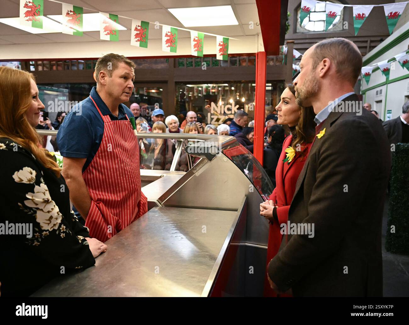 The Prince and Princess of Wales speak to Kevin Kidner (second left ...