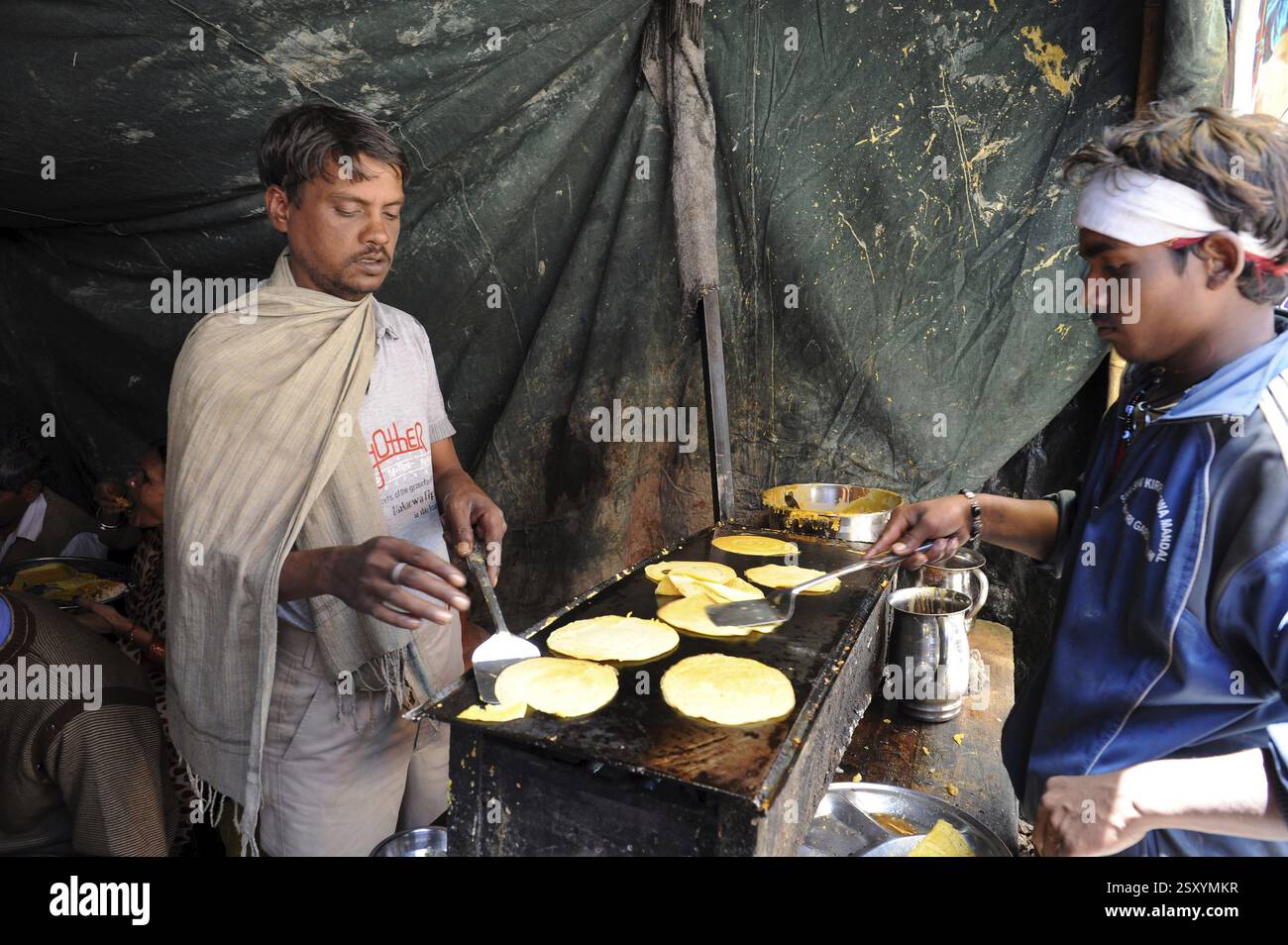 Man making food, amarnath yatra, Jammu Kashmir, India, Asia Stock Photo ...