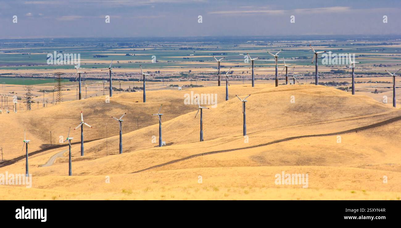 Vast expanse of land with numerous wind turbines scattered across the ...