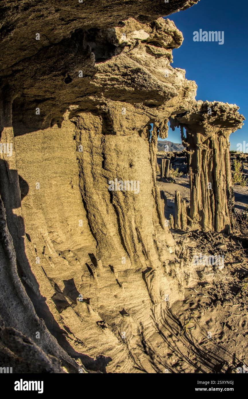 Large rock formation with a small hole in the middle. The hole is ...