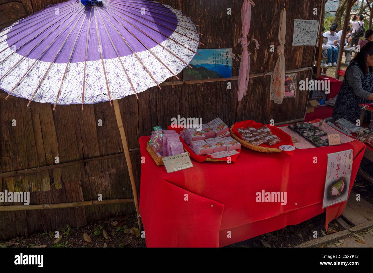View of shops selling traditional Japanese confectioneries and cuisines ...