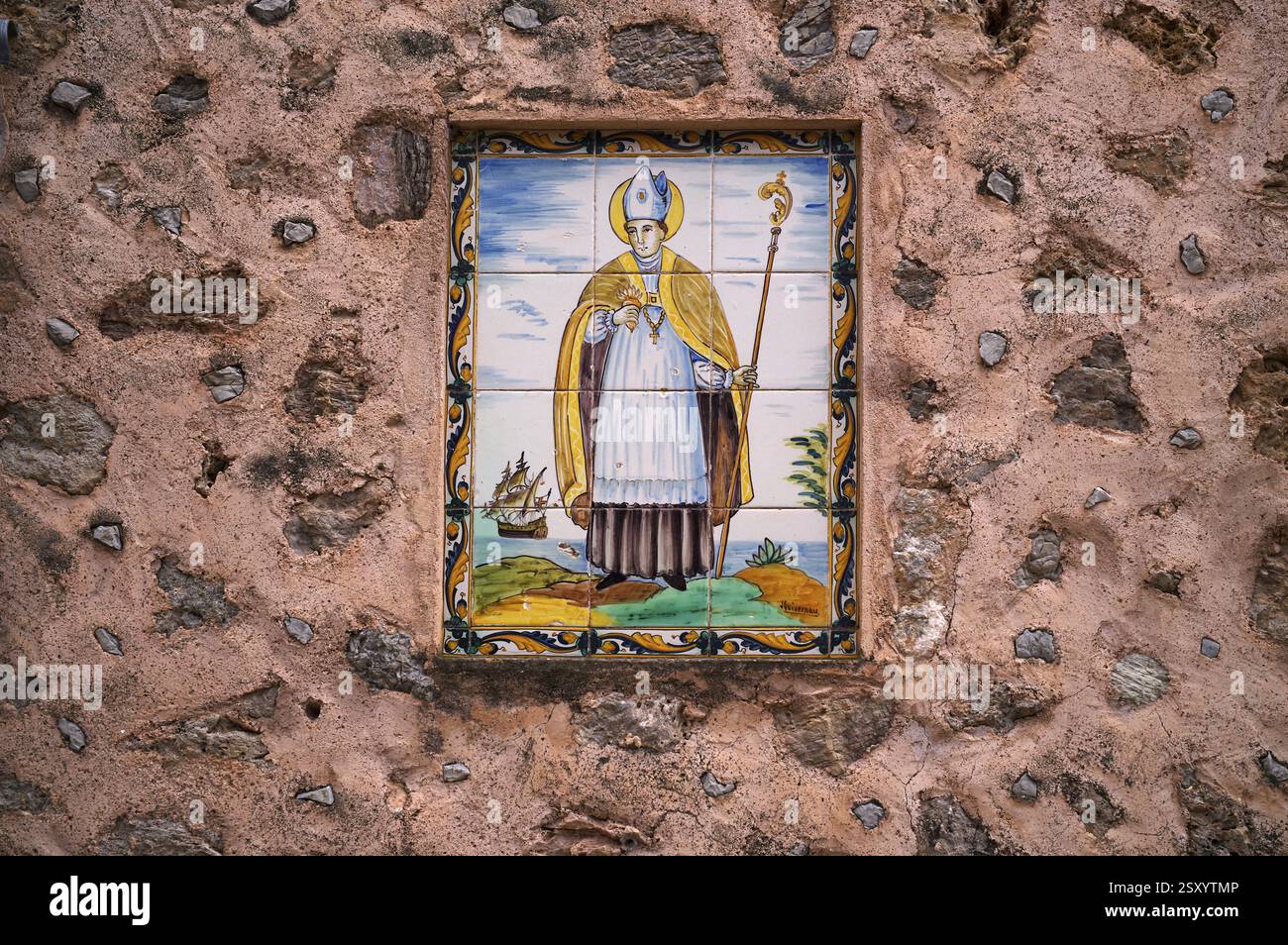 Baldosa, image of a saint, wall tile on the wall of a house, artist ...