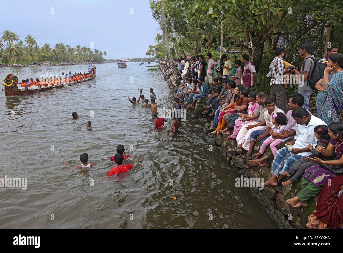 Spectators watch boat Racing in Punnamada Lake at Alleppey Kerala India ...