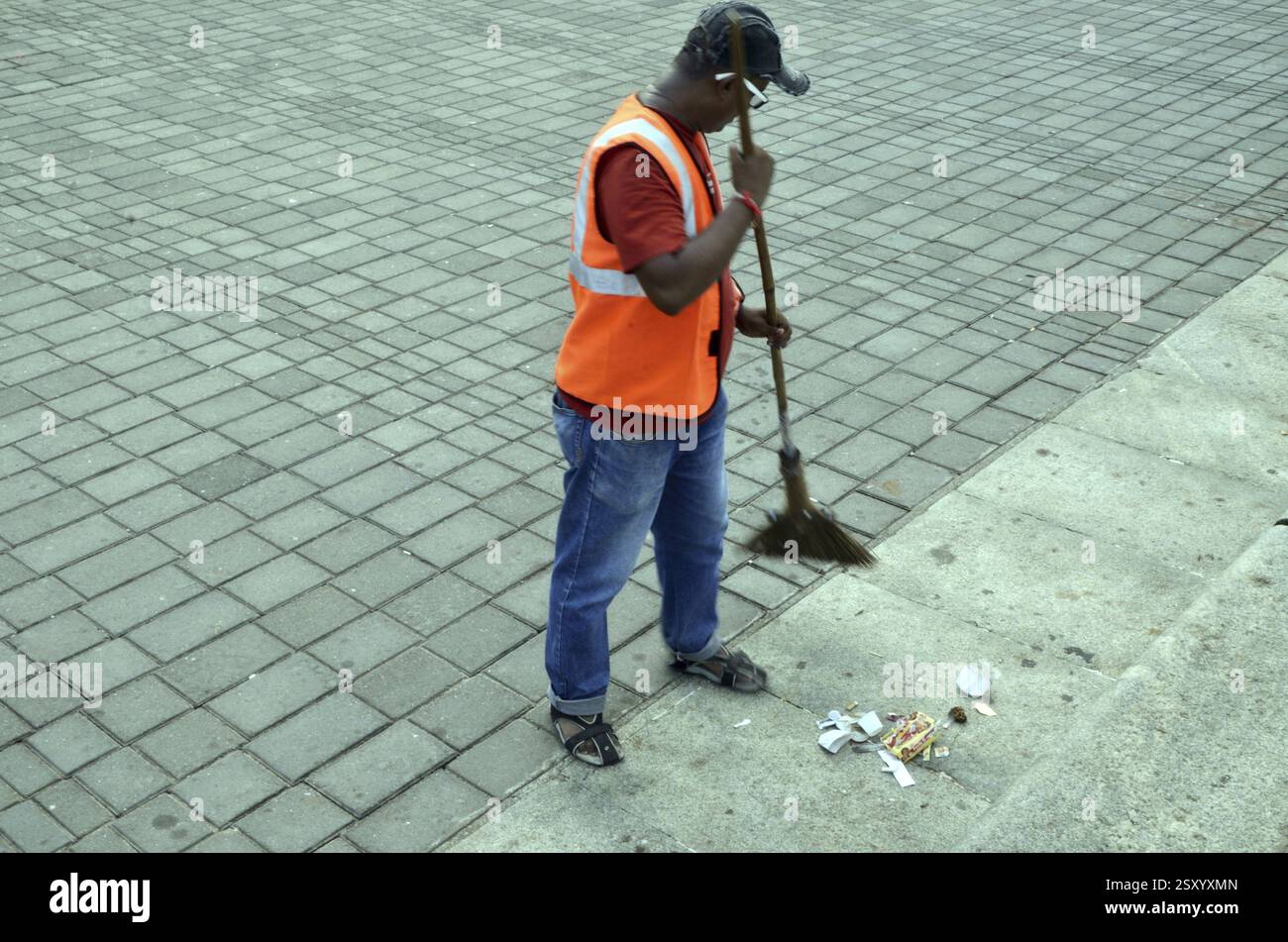Man cleaning footpath Marine Drive Mumbai Maharashtra India Stock Photo ...