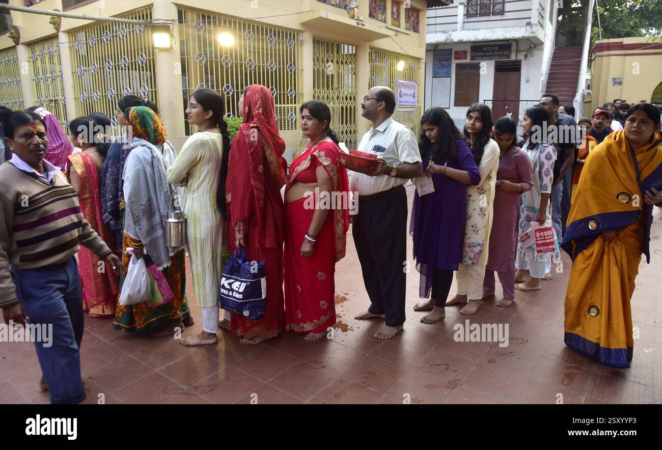 February 26, 2025, Guwahati, Guwahati, India: Devotees queue to offer ...