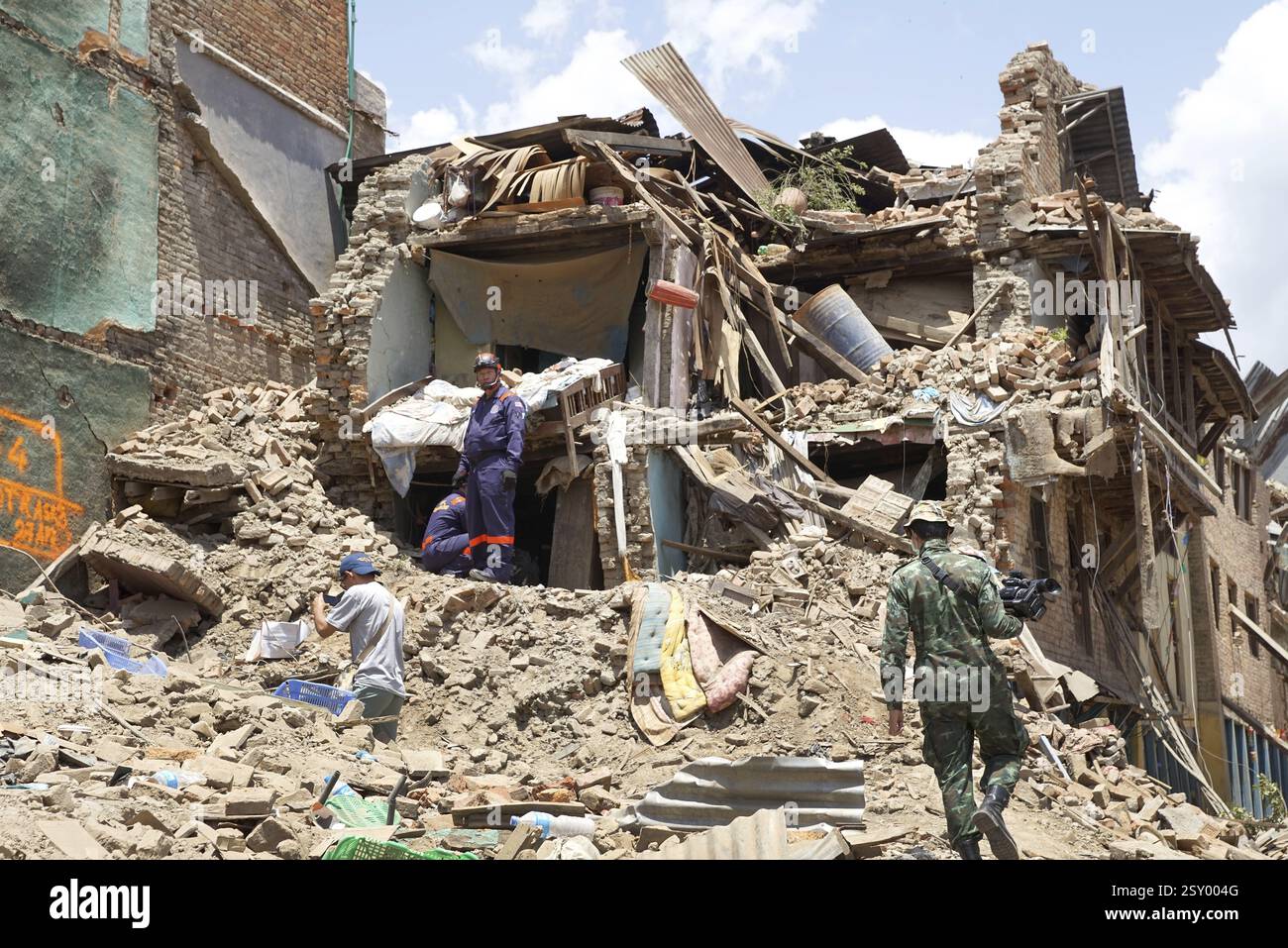 Rescue personnel searching dead bodies, nepal, asia Stock Photo - Alamy