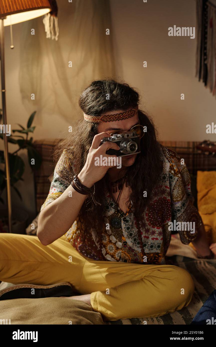 Capturing Moment with Vintage Camera in Retro Style Stock Photo - Alamy