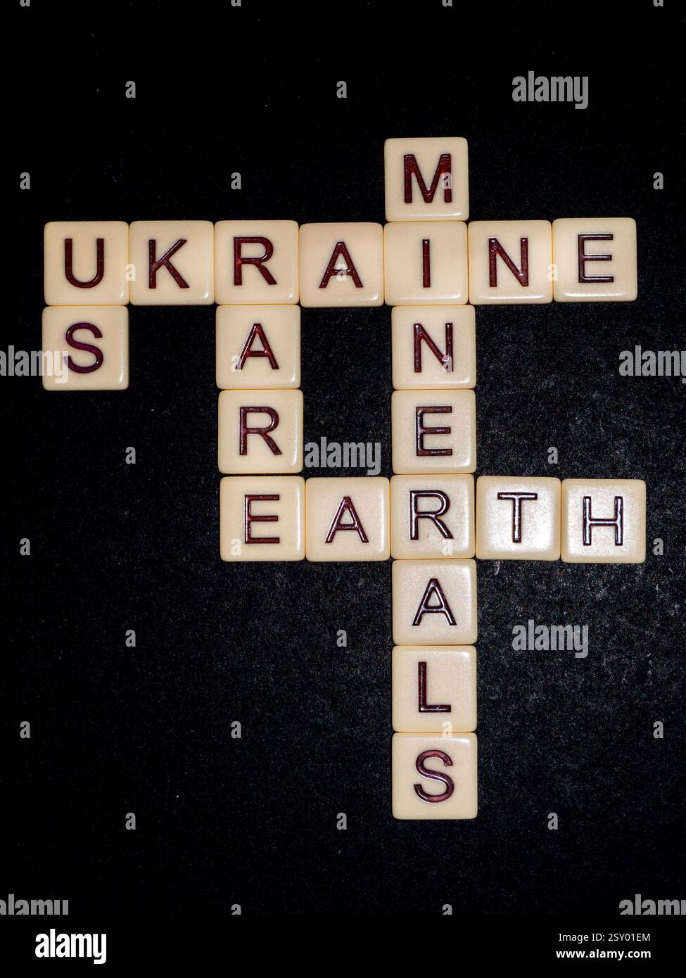 Word tiles spelling out the words Rare Earth Mineral Ukraine as Donald ...