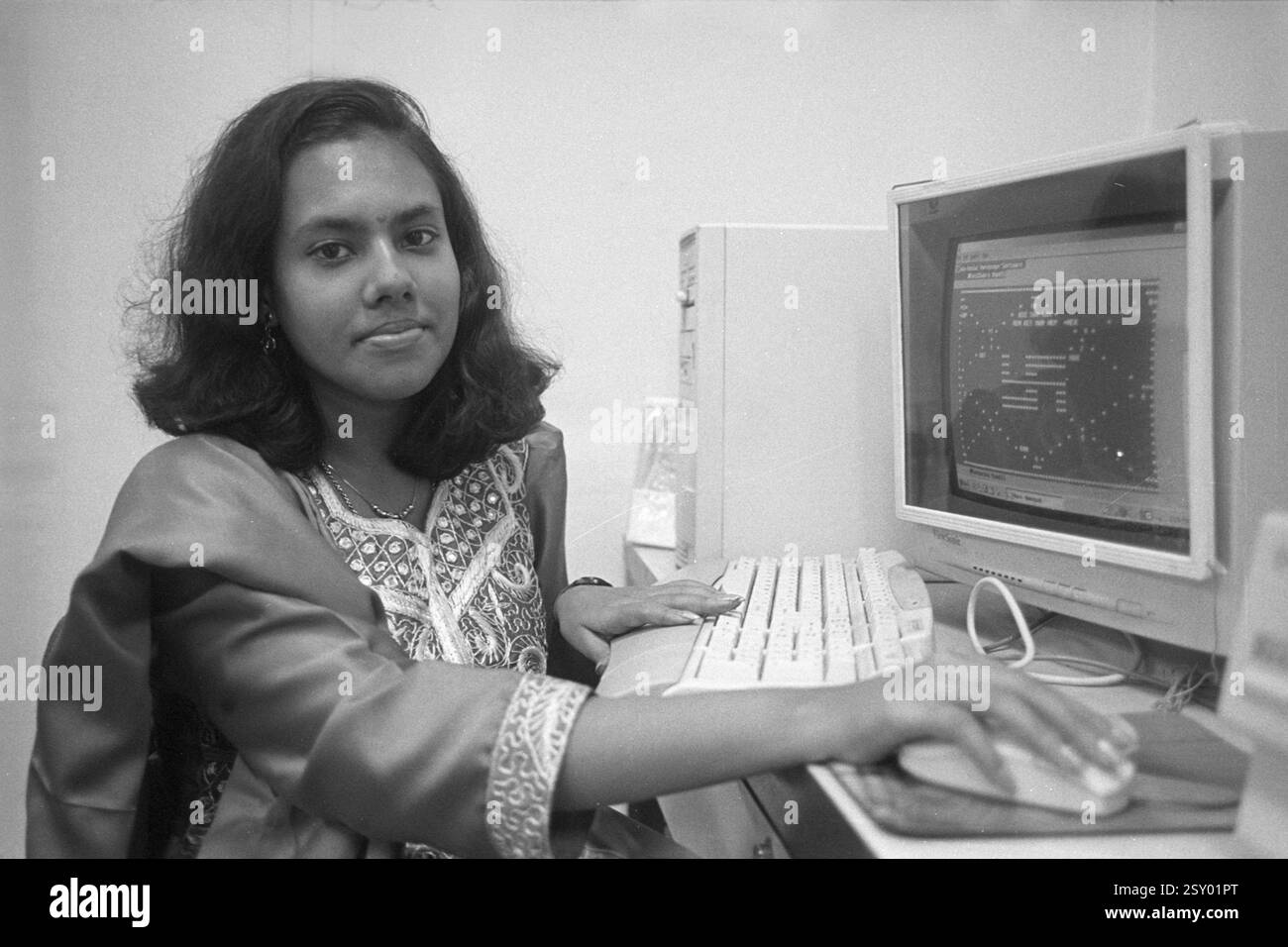 Two computer Black and White Stock Photos & Images - Alamy