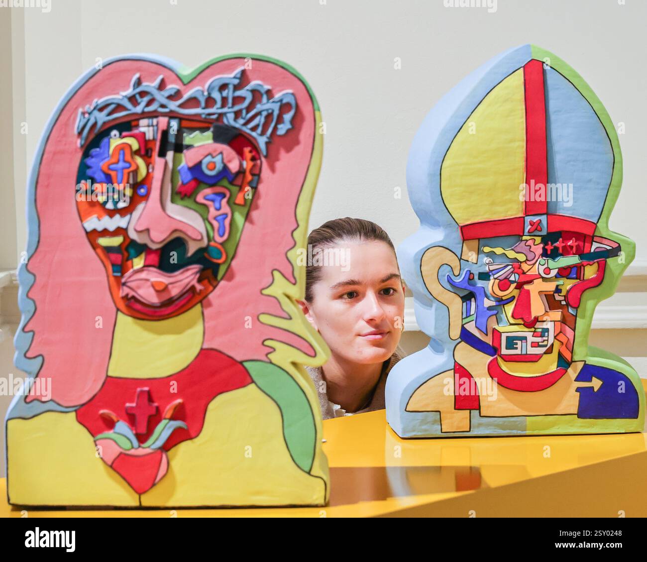 London, UK. 26th Feb, 2025. Staff pose with 'Jesus Sculpture with ...