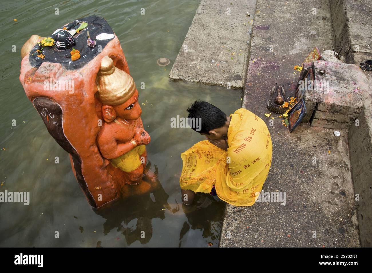 Child sadhu praying hanuman statue, Nasik, maharashtra, india, asia ...