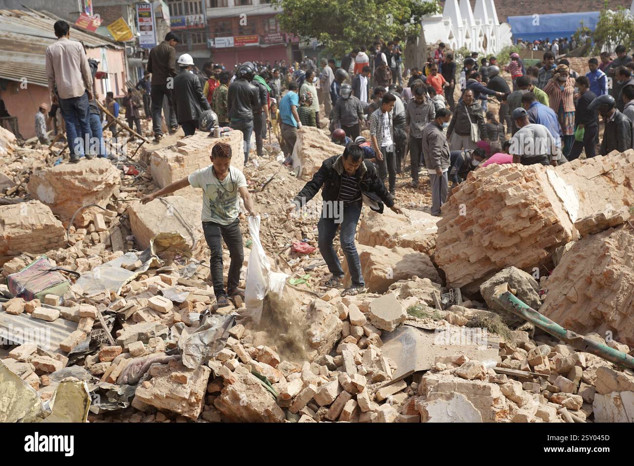 People searching dead bodies base of dharahara, kathmandu, nepal, asia ...
