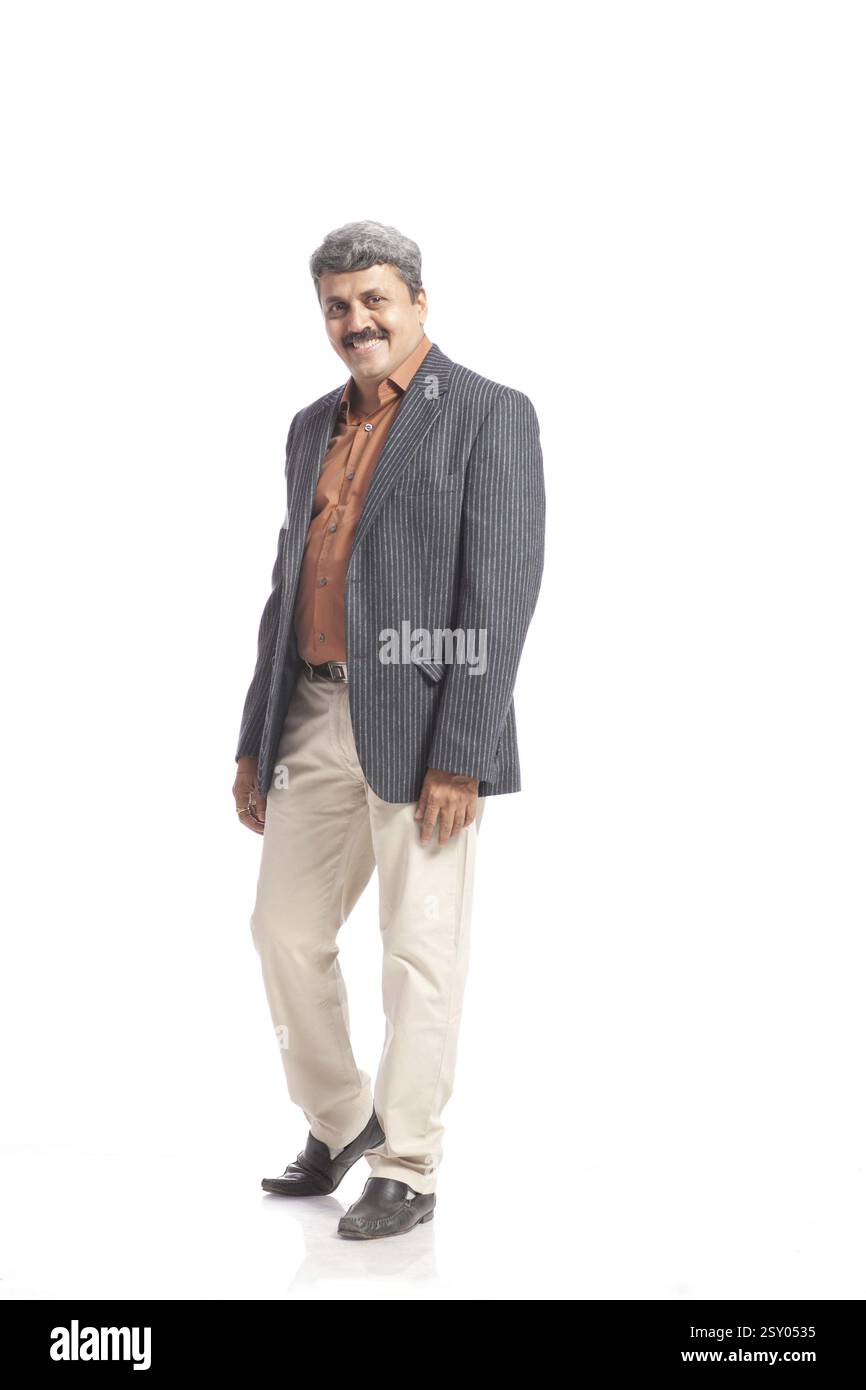 Indian man standing Cut Out Stock Images & Pictures - Alamy