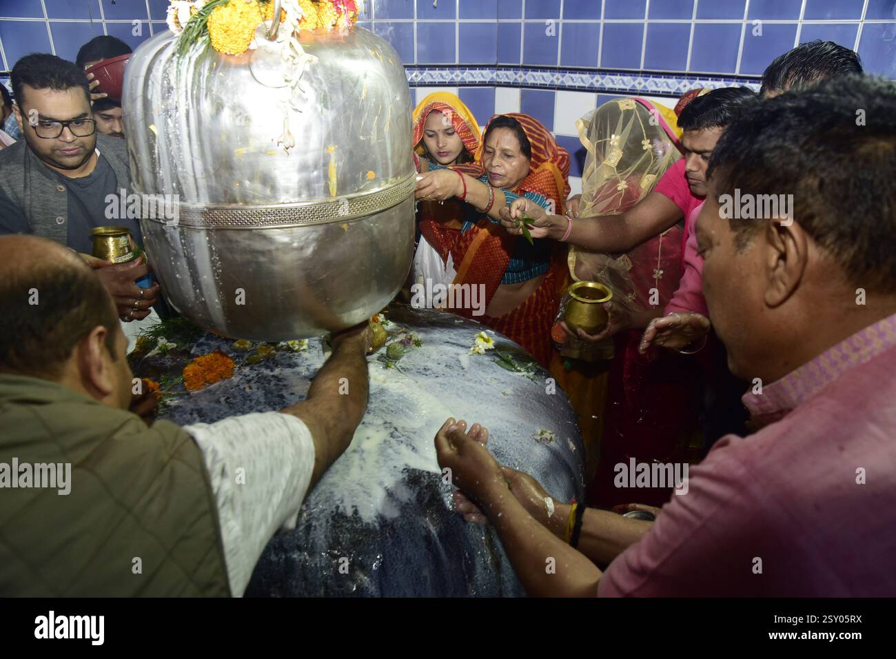 Guwahati, Guwahati, India. 26th Feb, 2025. Devotees offer prayer to ...