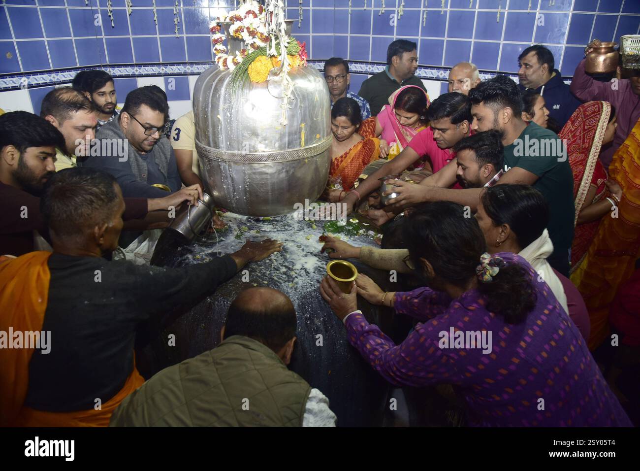 Guwahati, Guwahati, India. 26th Feb, 2025. Devotees offer prayer to ...