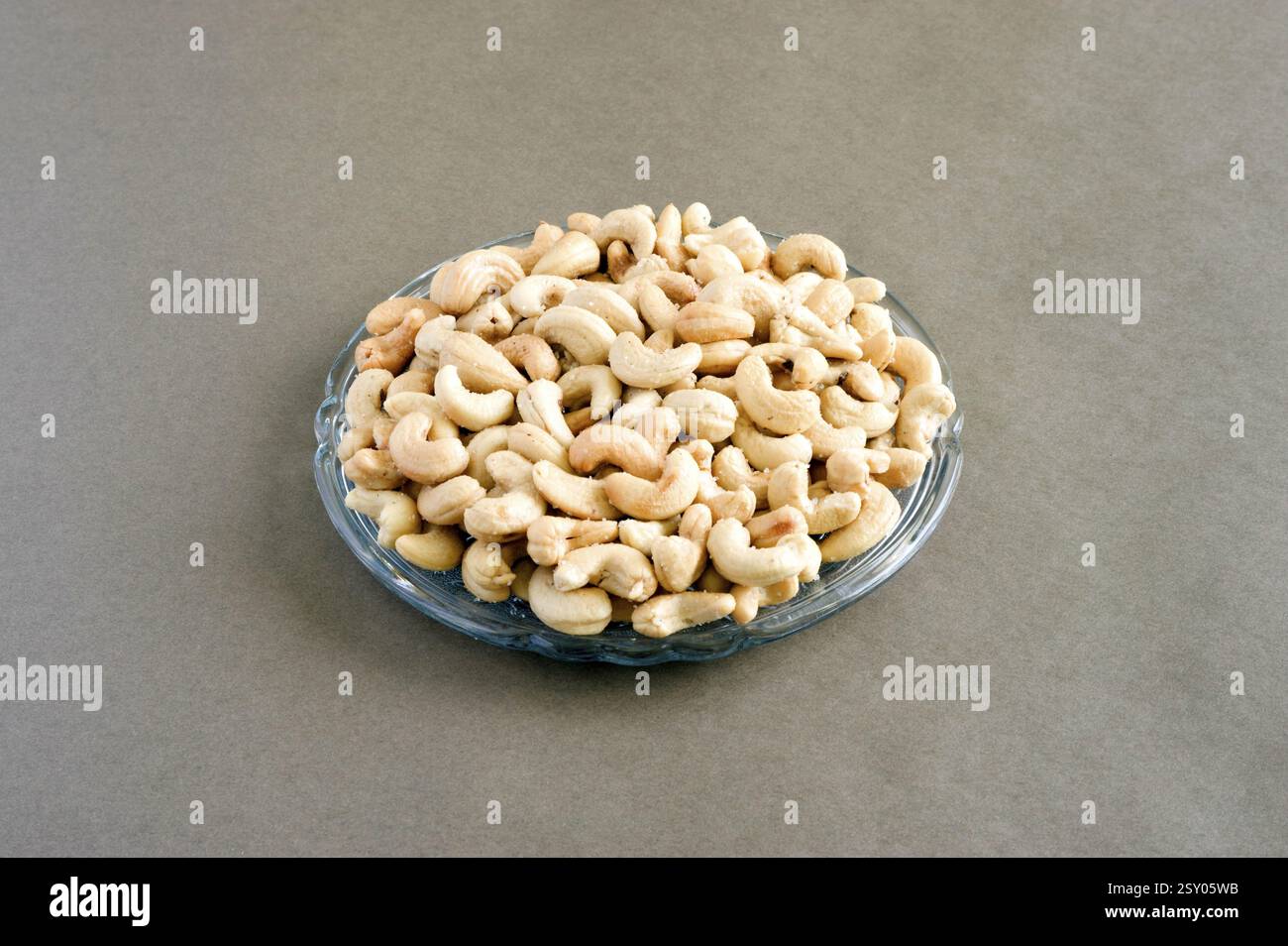 Roasted and salted cashew nuts in plate, goa, india, asia Stock Photo ...