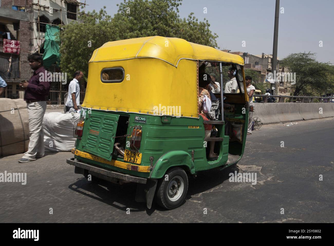 Auto rickshaw running on the streets New Delhi India Asia Stock Photo ...