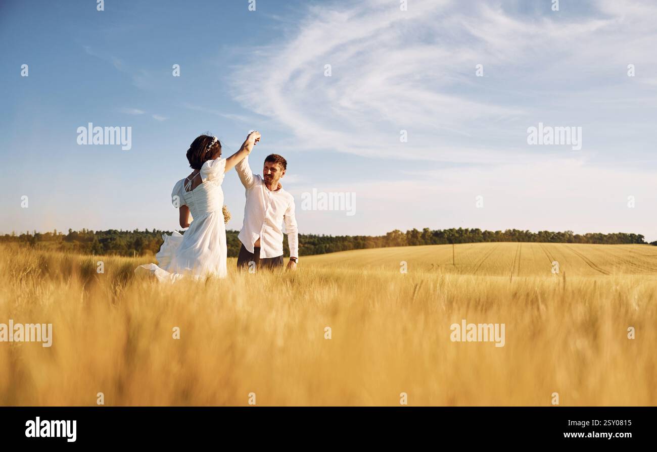 In dress and formal clothes. Couple just married. Together on the ...