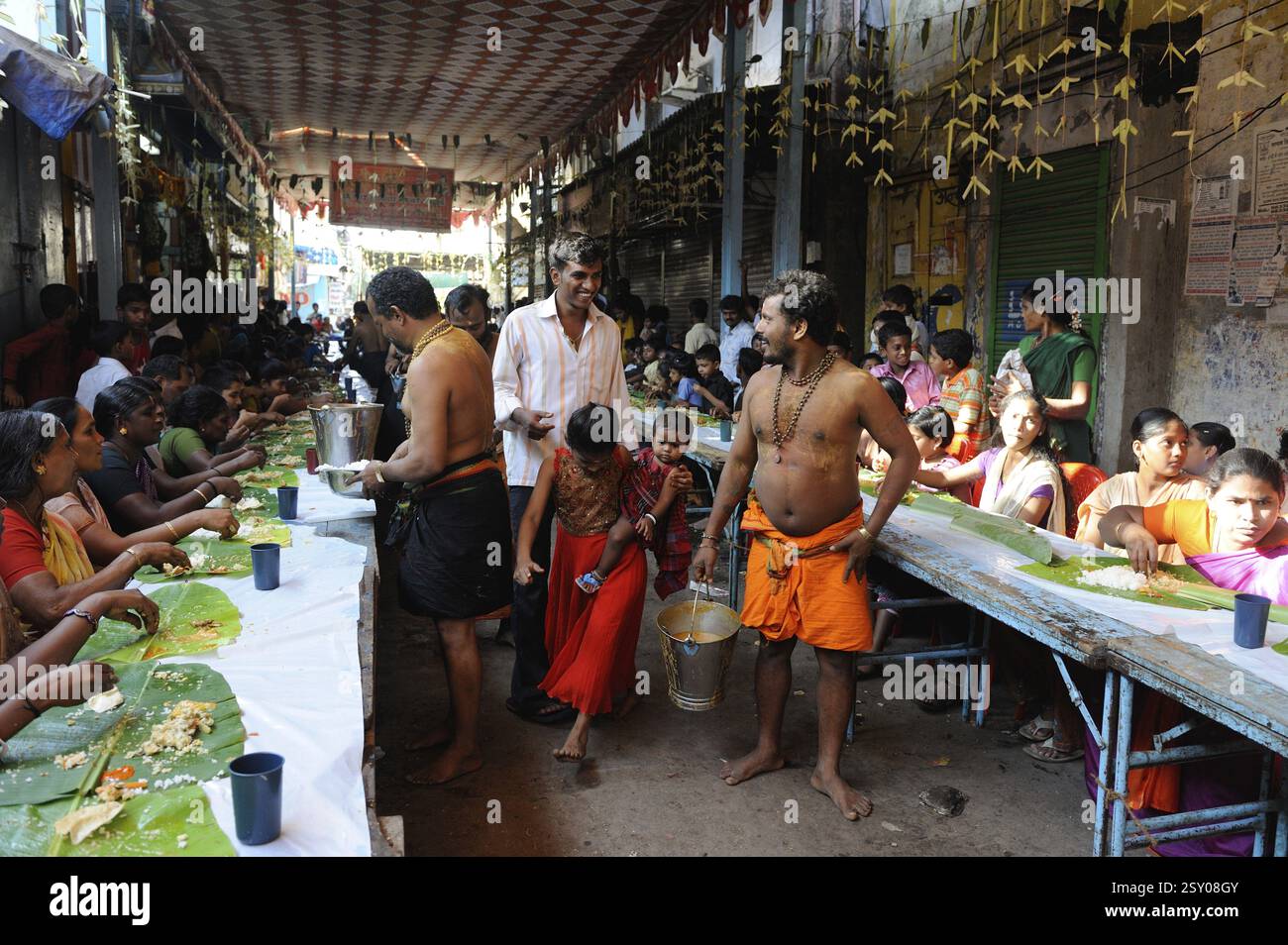 People eating meal Slum Dharavi Mumbai India Asia Stock Photo - Alamy