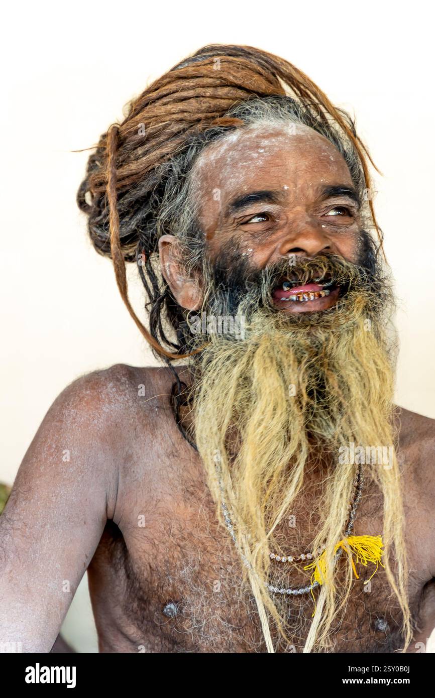 spiritually enlightened naga saint with joyful expressions at mahakumbh ...