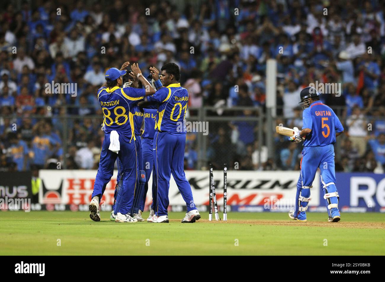 Sri Lankan team members celebrate wicket batsman Gautam Gambhir 2011 ICC World Cup Final ...
