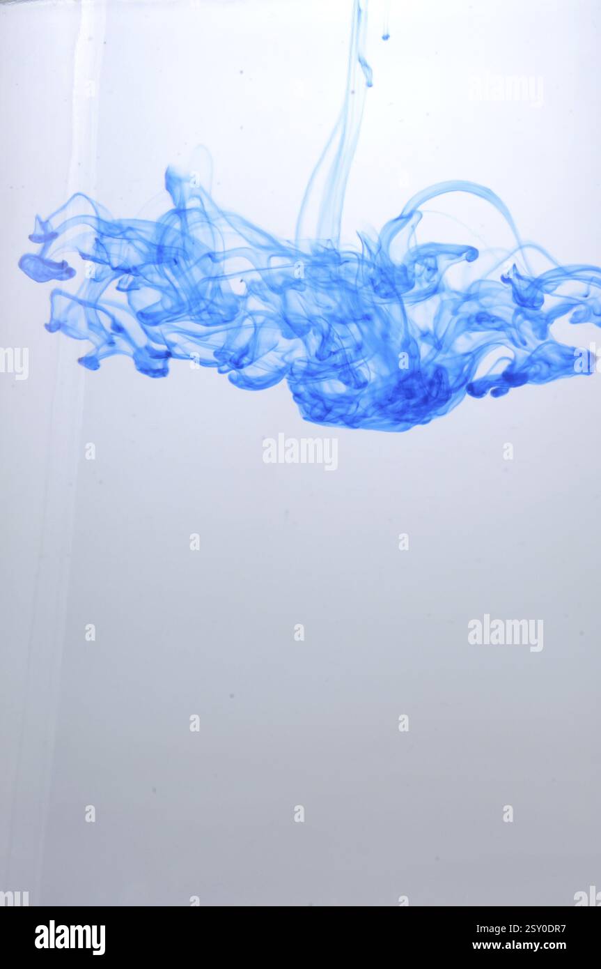 Light bulb on splashes on abstract background Stock Photo - Alamy