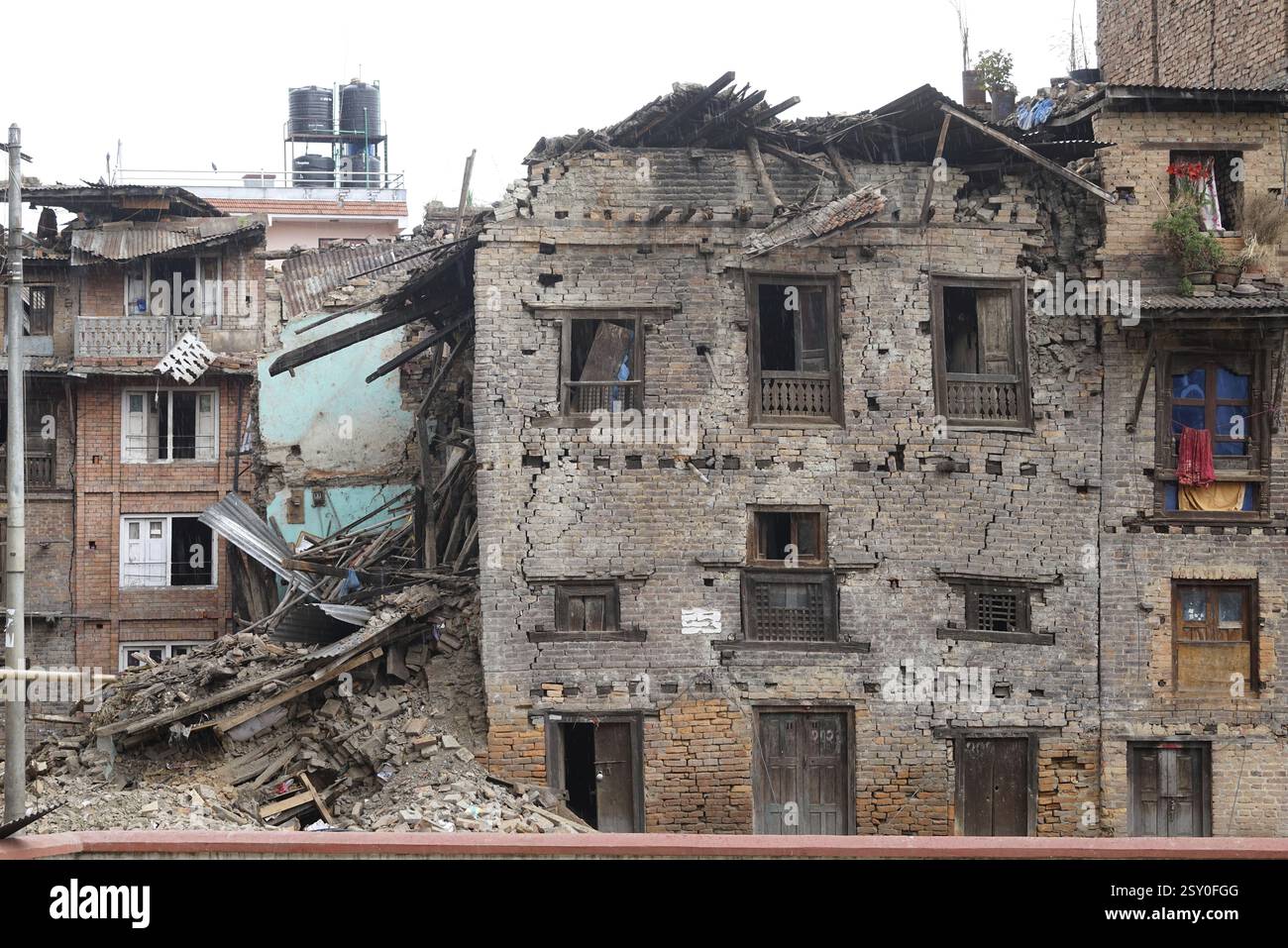 Residential building collapsed, earthquake, nepal, asia Stock Photo - Alamy