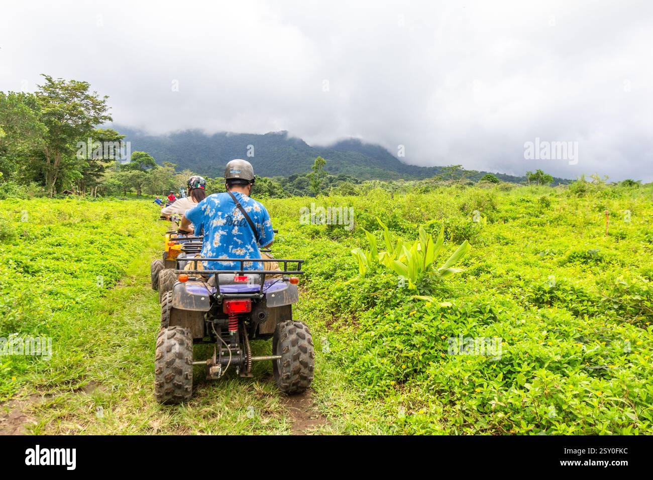Tourists on ATVs enjoy an exhilarating countryside ride through the ...