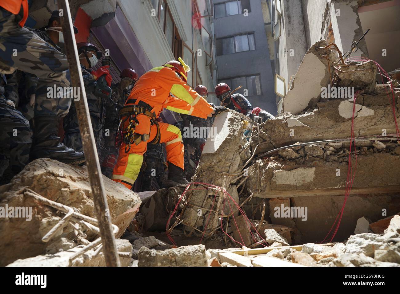 Rescue personnel searching dead bodies, earthquake, nepal, asia Stock ...
