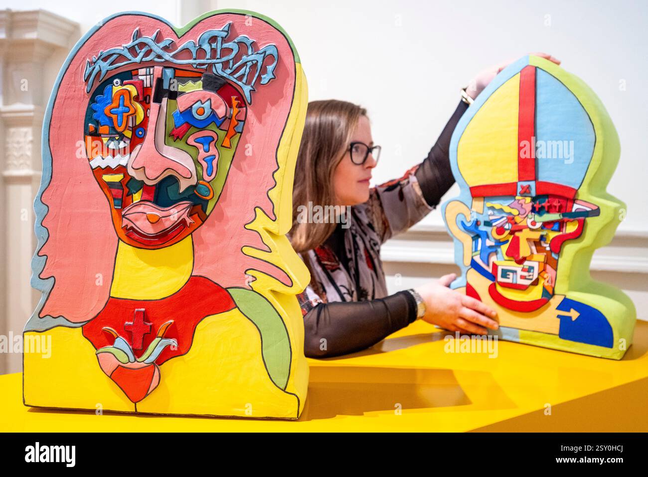 London, UK. 26 February 2025. (L) ‘Jesus Sculpture with Robbie Williams ...