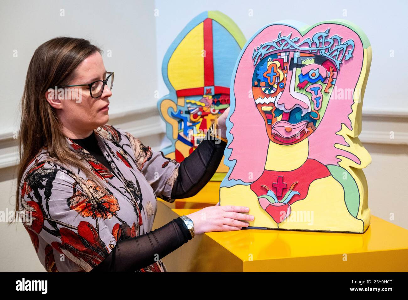 London, UK. 26 February 2025. (R) ‘Jesus Sculpture with Robbie Williams ...