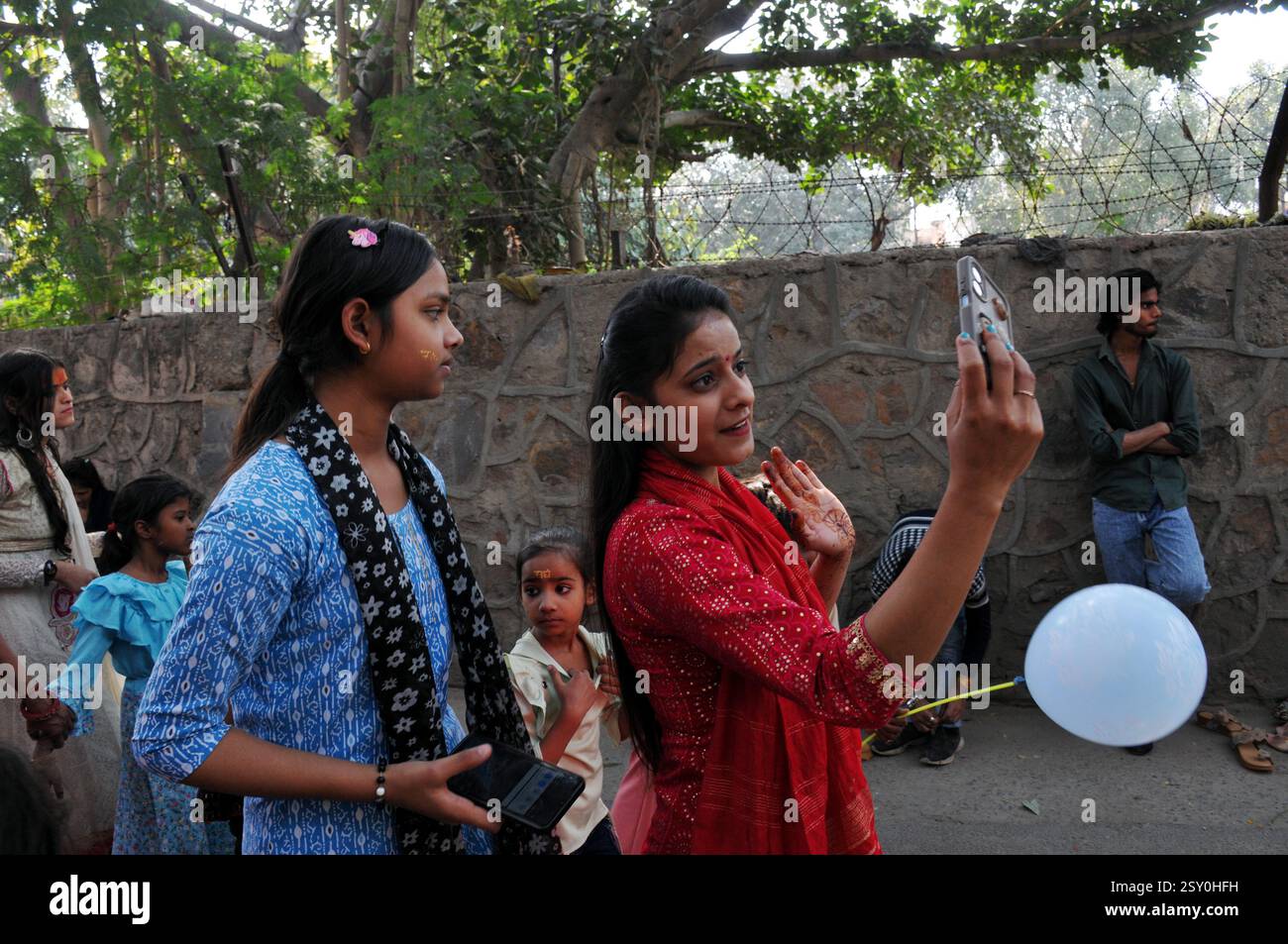 New Delhi, Delhi, India. 26th Feb, 2025. Selfie during the worship ...