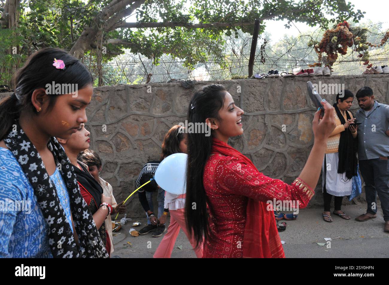New Delhi, Delhi, India. 26th Feb, 2025. Indian Hindu Devotess pray and ...