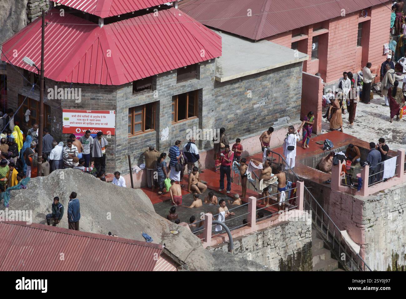 Devotees having hot water spring Badrinath town Uttarakhand India Asia ...