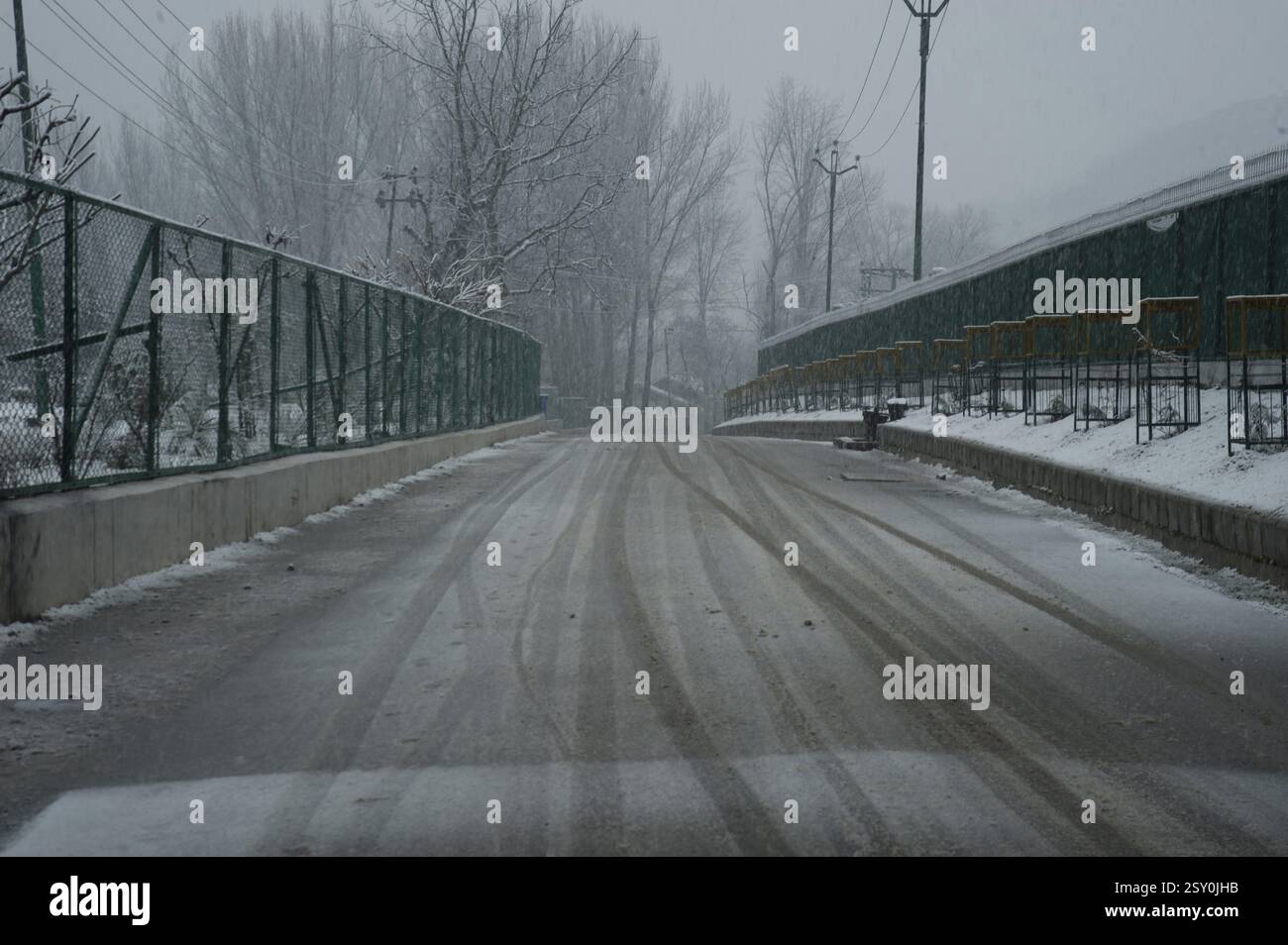 Snow covered road, srinagar, kashmir, india, asia Stock Photo - Alamy