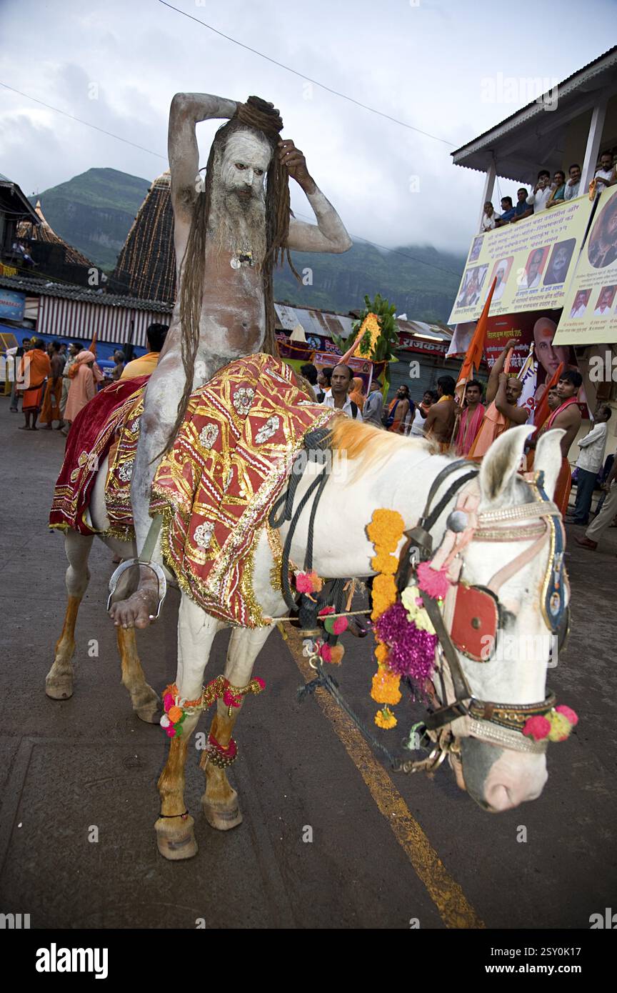 Naga baba sadhu riding on horse, Nasik, maharashtra, india, asia Stock ...