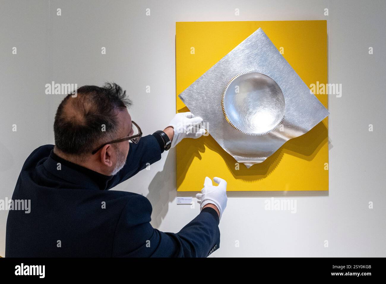 London, UK. 26 February 2025. ‘Unzipped Wall/ Table Sculpture’, silver ...