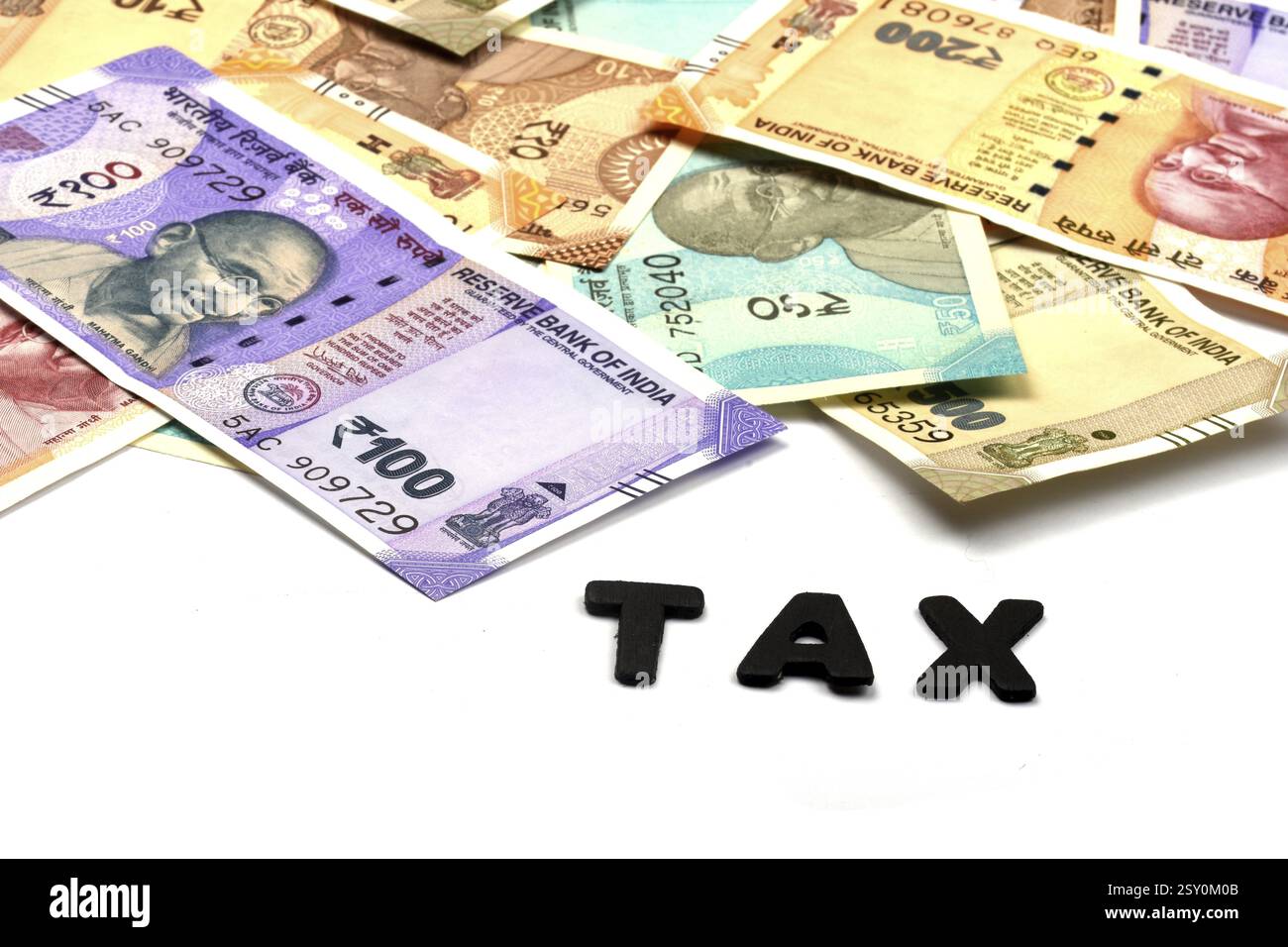 TAX concept, TAX alphabet on money background, business and financial ...