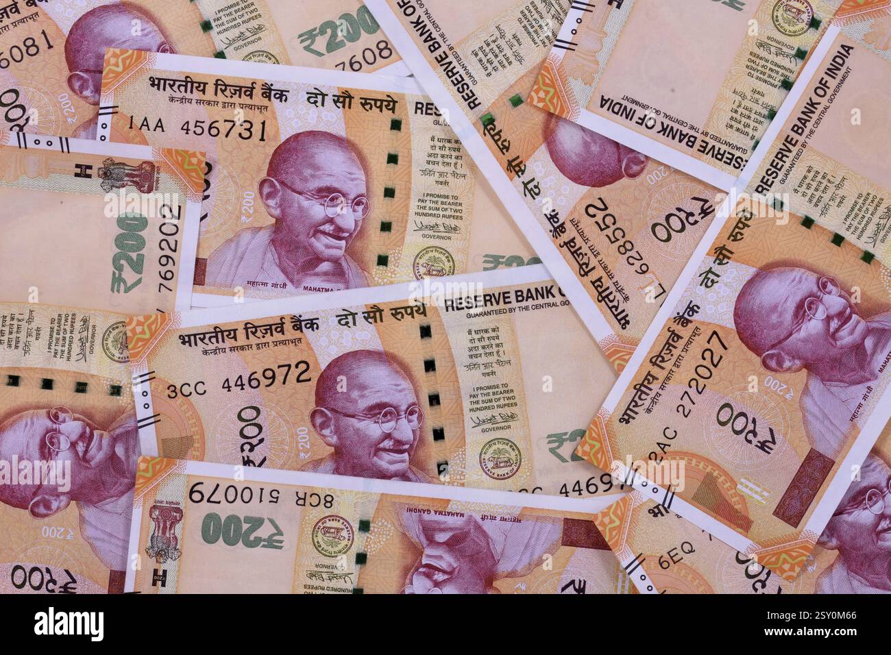 New Indian currency of 200 rupee notes background Stock Photo - Alamy