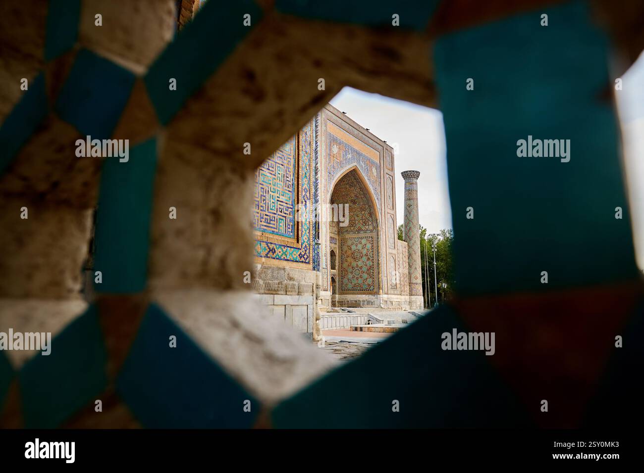 Beautiful arch and minaret with towers at Registan old public square ...