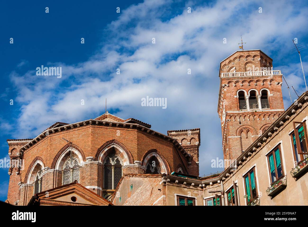 Beautiful Frari Basilica gothic apse and medieval bell tower rise above ...