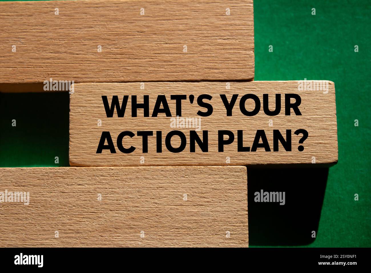 What's your action plan message written on wooden block on green ...