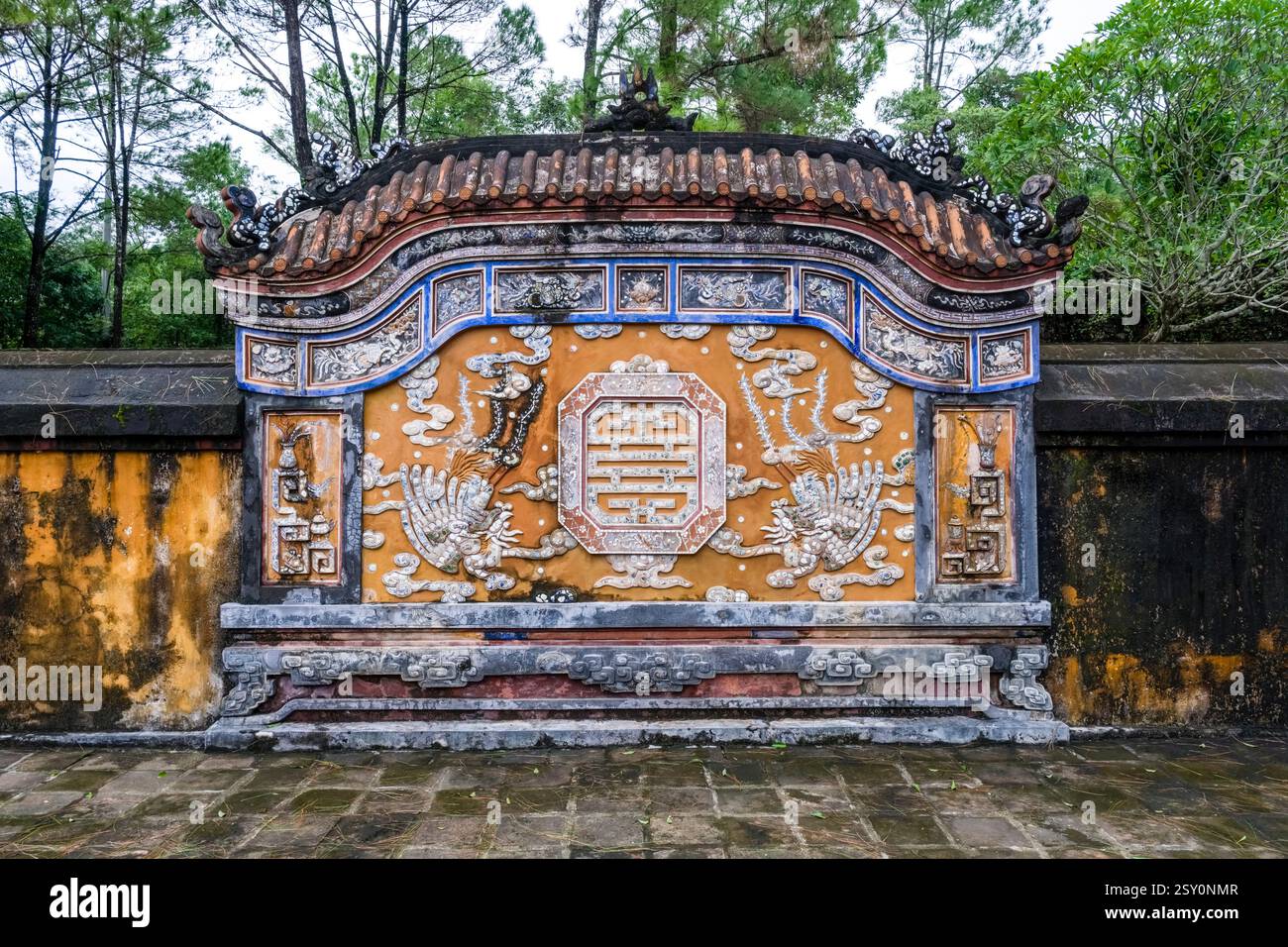 Artfully decorated part of one of the stone walls of the tomb of ...