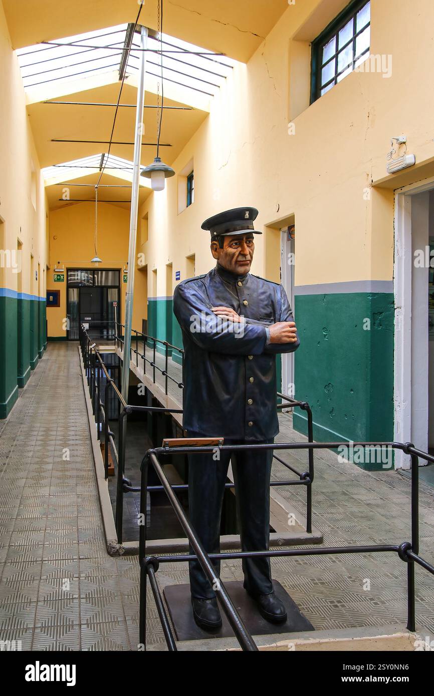 Statue of a guard in a corridor leading to the prison cells of the old ...