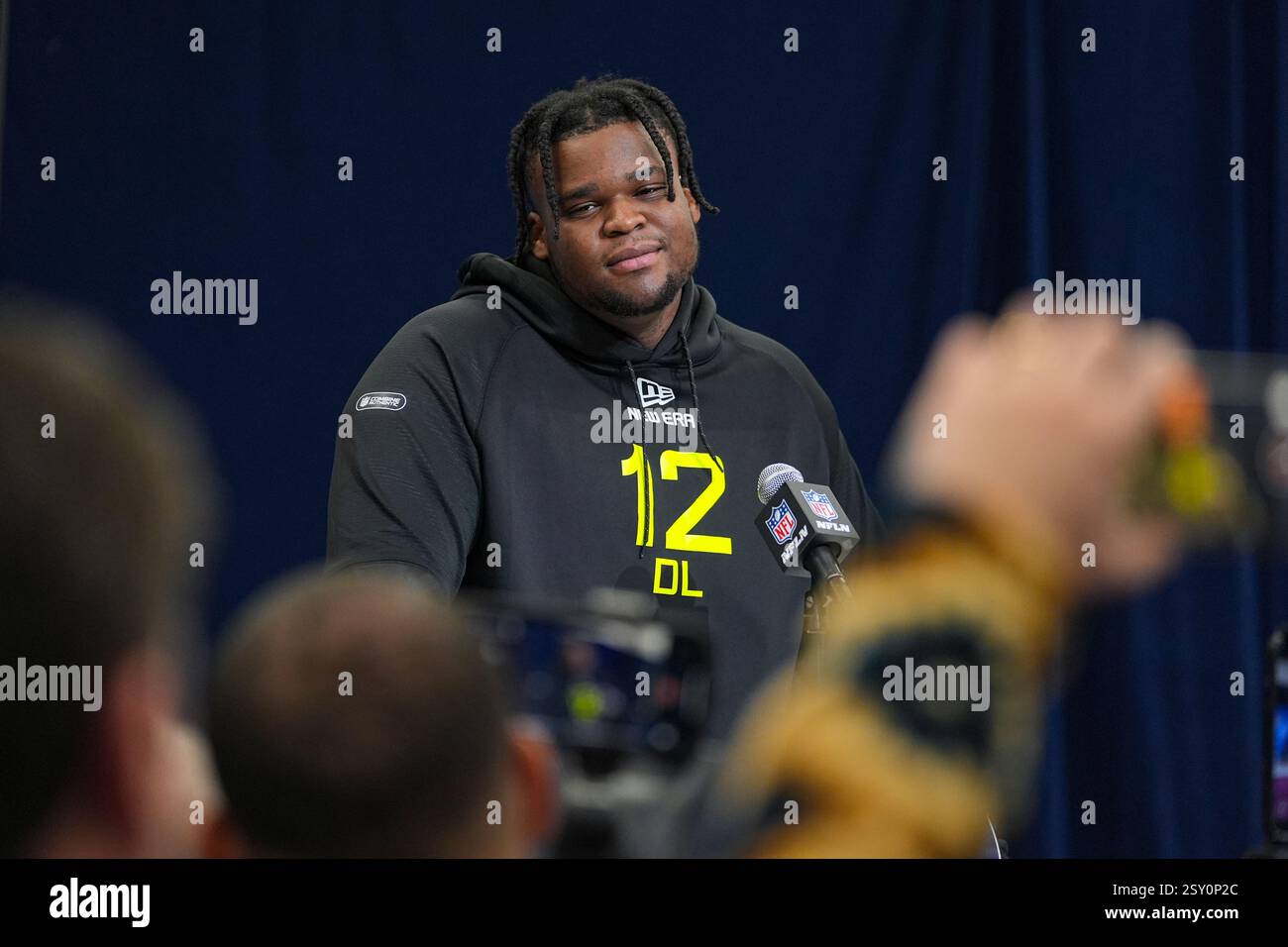 Michigan defensive lineman Kenneth Grant speaks during a press ...