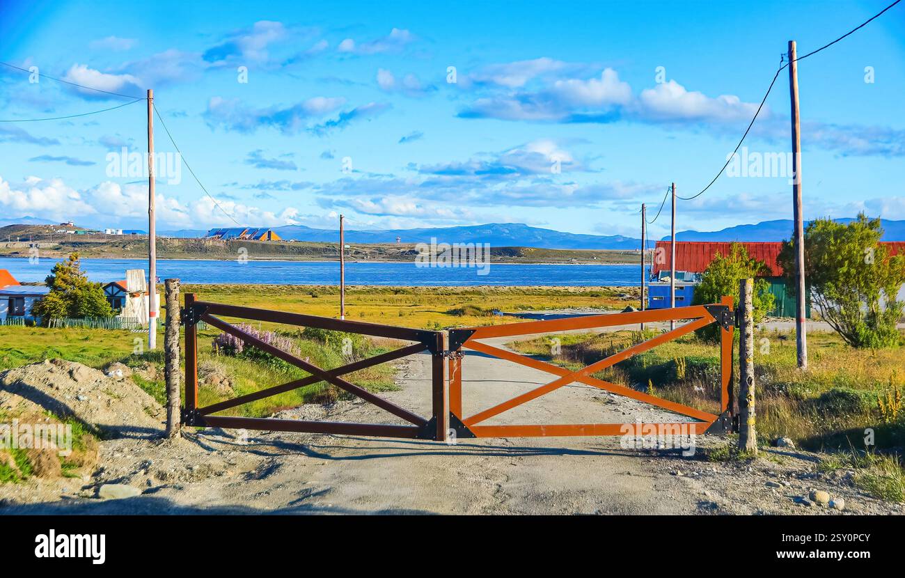 Gated road leading to the Beagle Channel near Ushuaia Airport in the ...