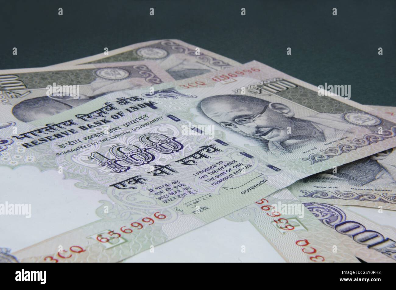 Concept of Indian currency one hundred rupee notes Stock Photo - Alamy